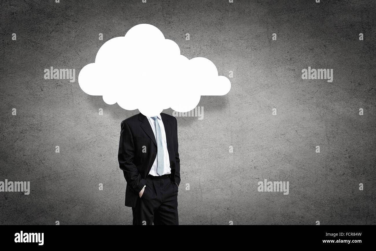 Businessman standing with his head in cloud Stock Photo - Alamy