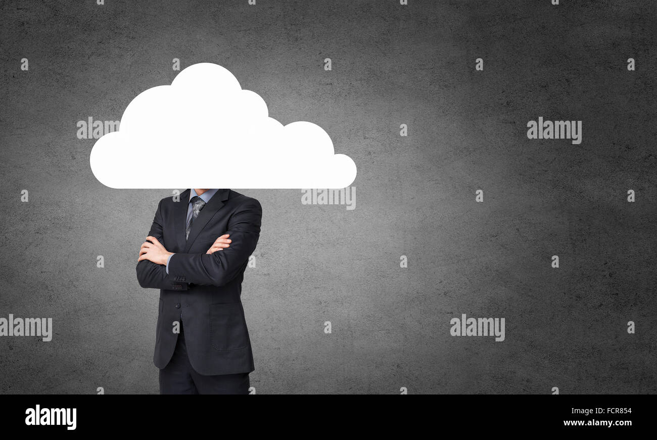 Businessman standing with his head in cloud Stock Photo - Alamy