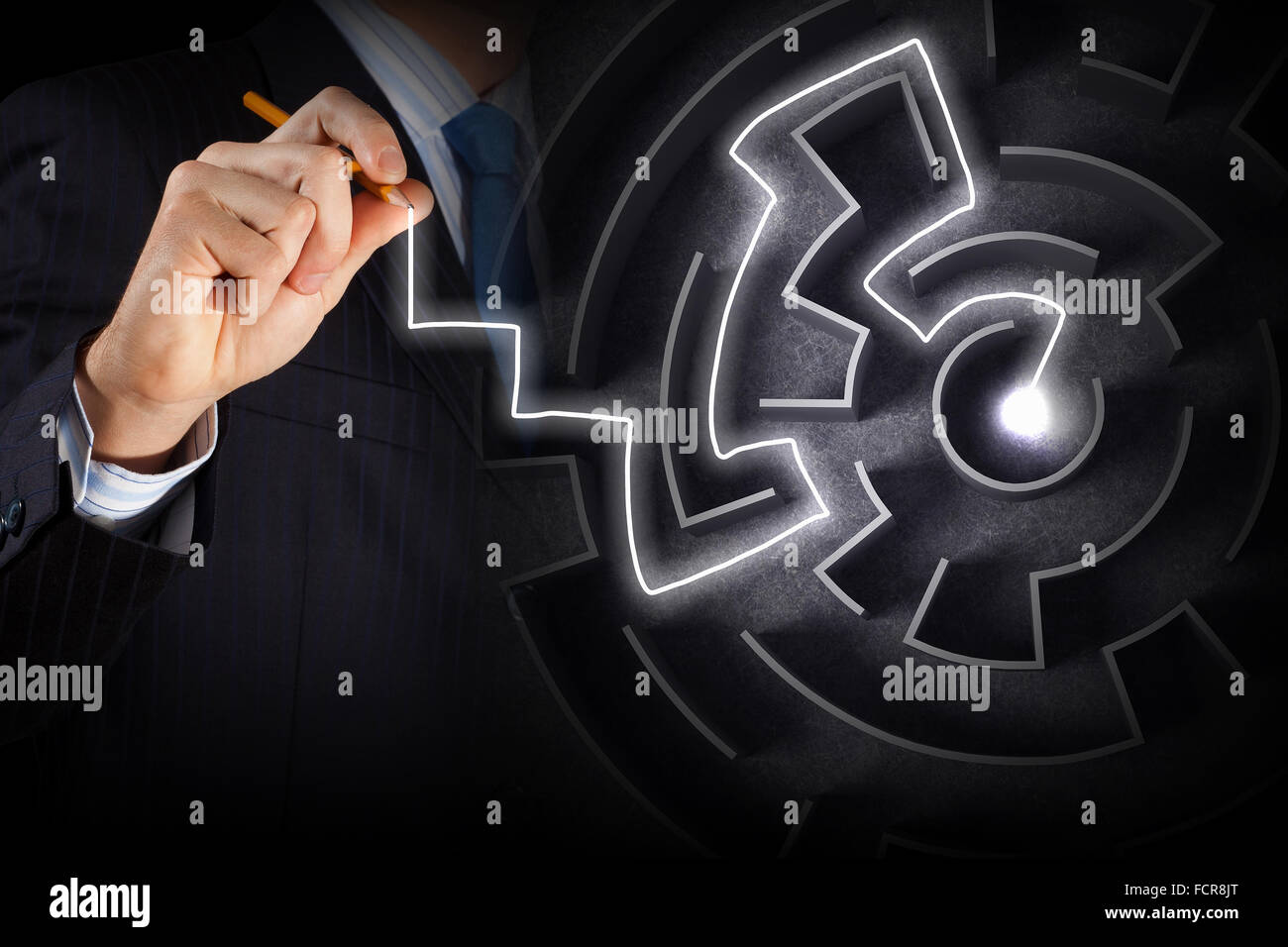 Close up of businessman drawing way out of labyrinth Stock Photo - Alamy