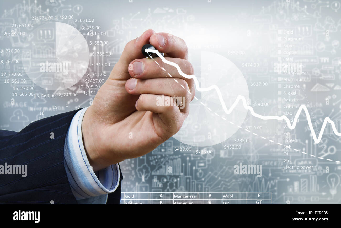 Close up of businessman drawing increasing graph with marker on media ...