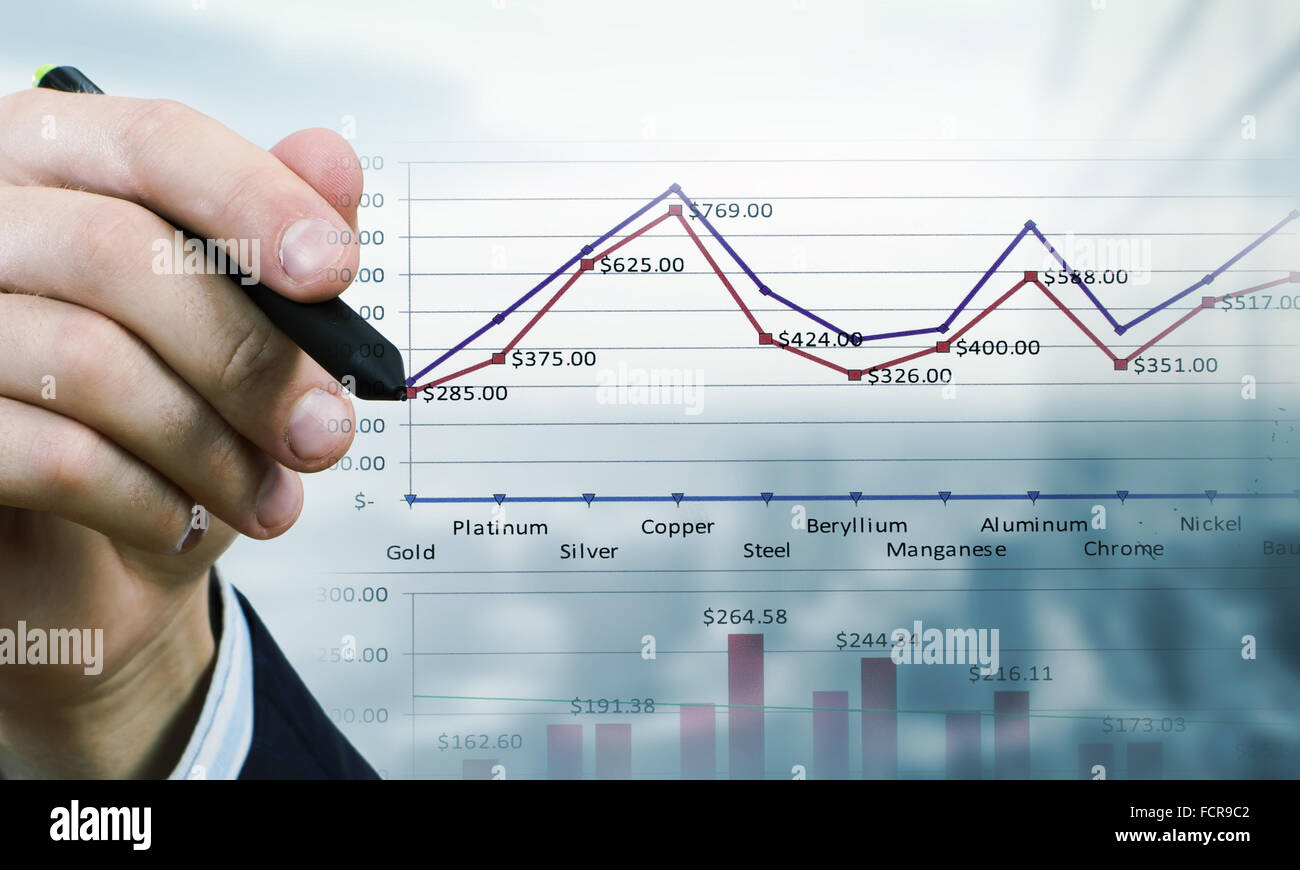 Close up of businessman drawing increasing graph with marker on media ...