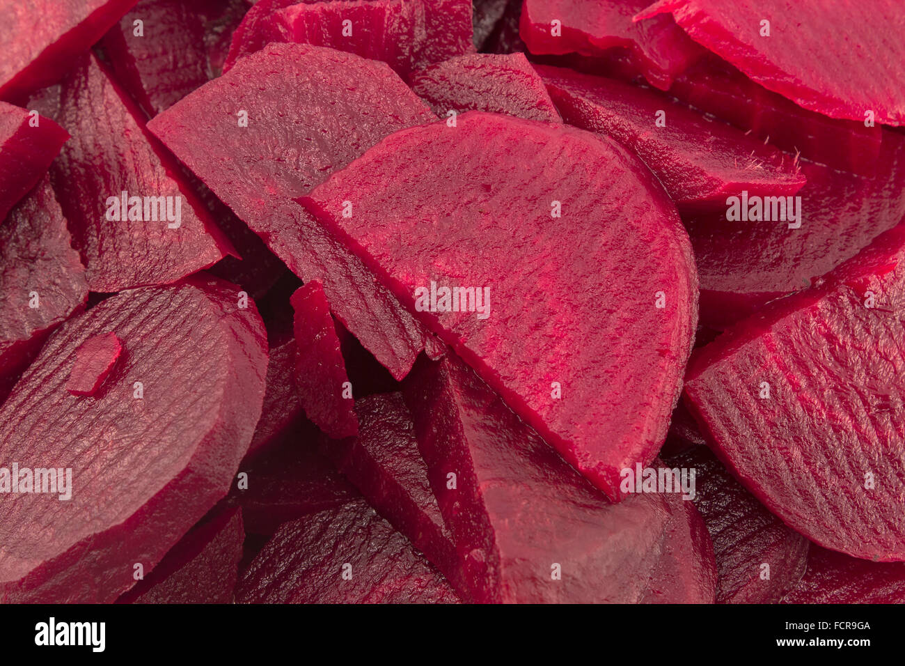 Cooked sliced beets as background Stock Photo - Alamy