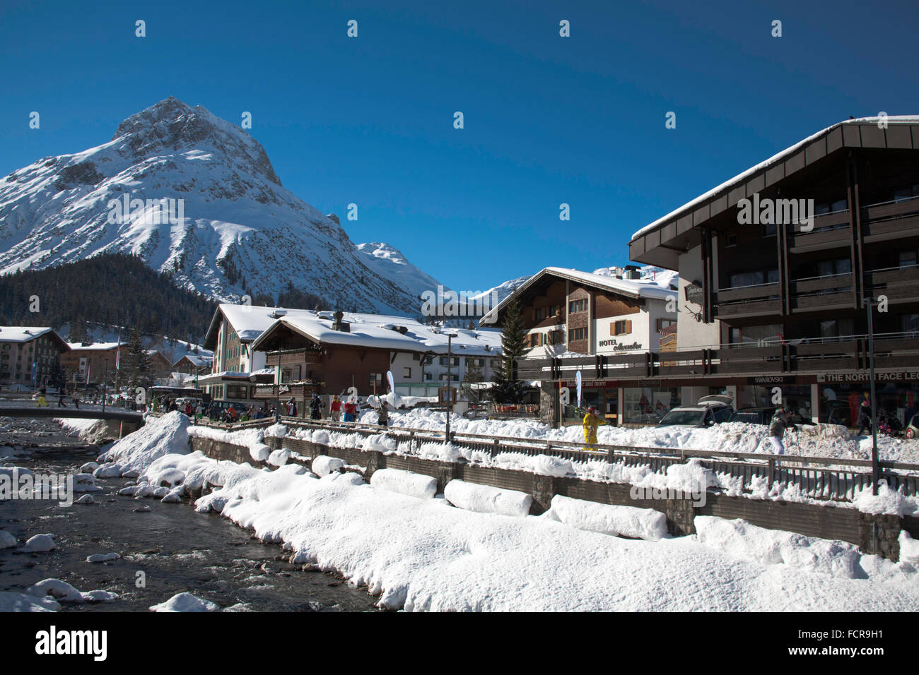 The River Lech flowing through Lech with The Omeshorn in the background ...