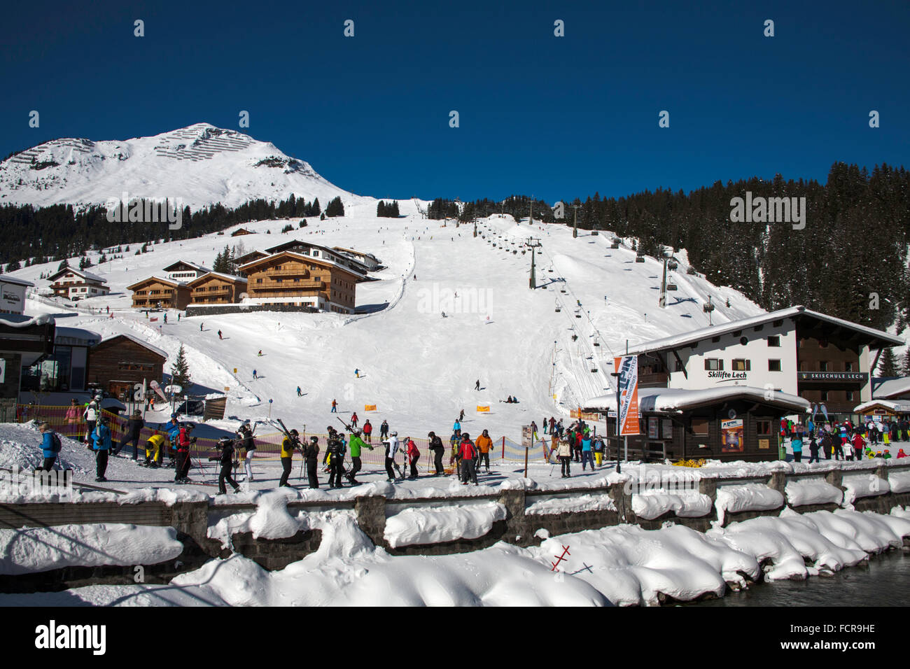 Ski schools and ski pistes beside The River Lech Lech Arlberg Austria ...