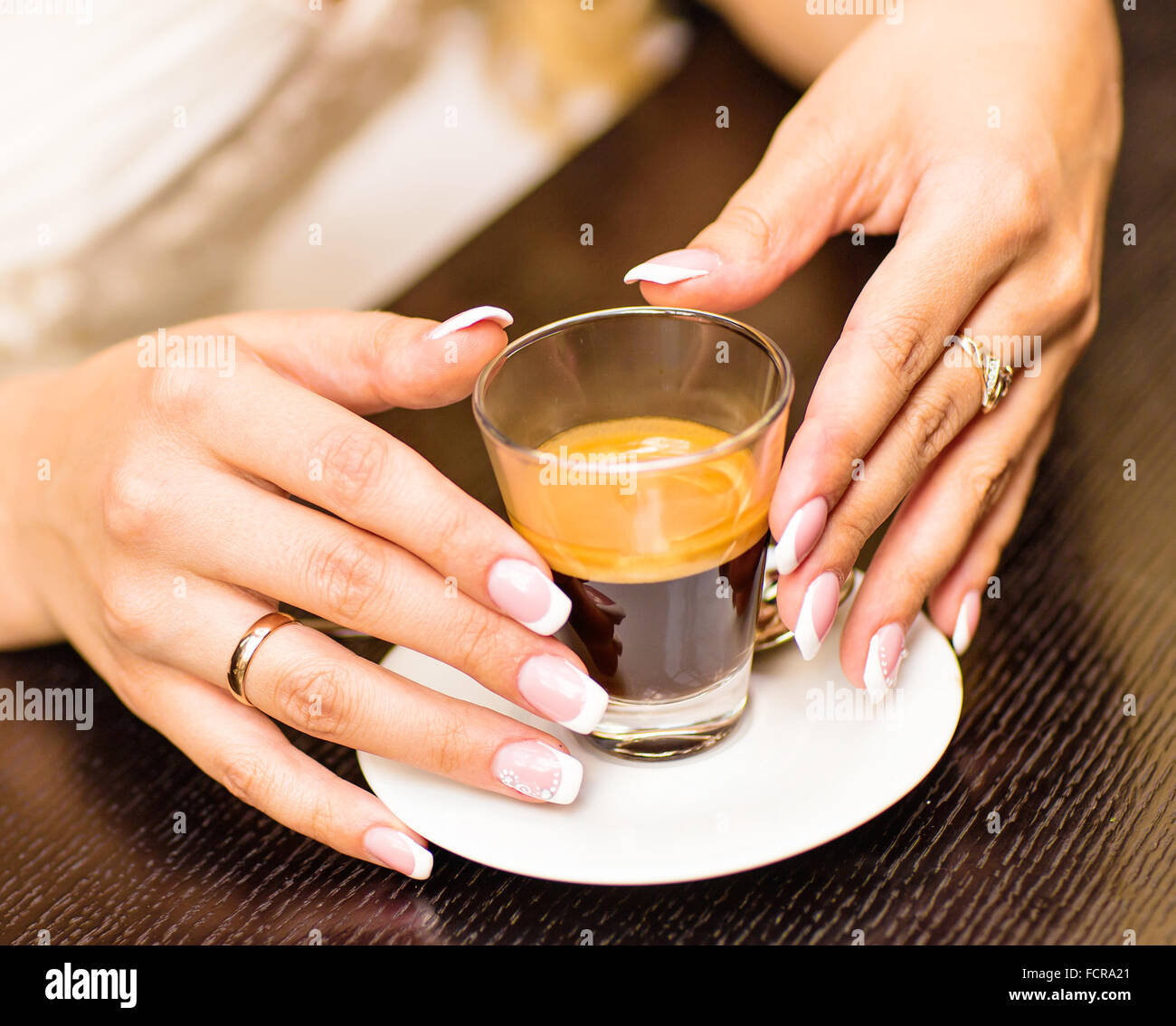 glass cup of tea in female hand Stock Photo - Alamy