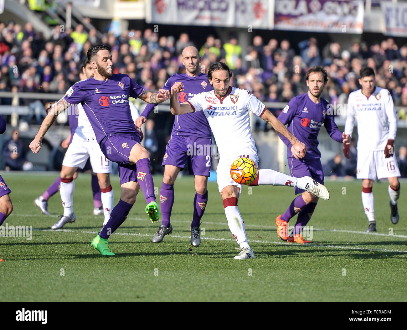 Florence, Italy. 24th Jan, 2016. Emiliano Moretti (middle) shots during ...