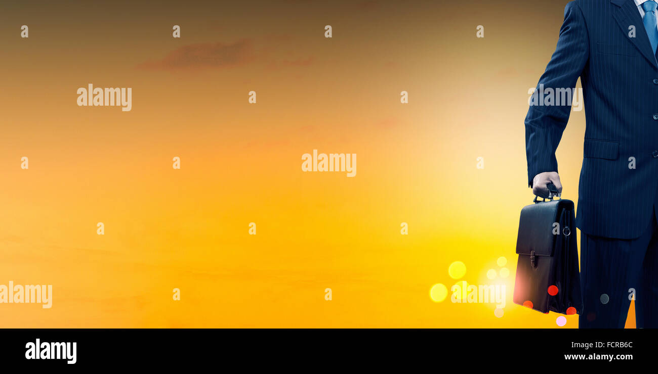 Rear view of businessman and night city at background Stock Photo - Alamy