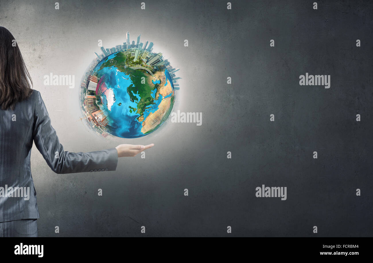 Close up of female hand holding our Earth planet. Elements of this ...