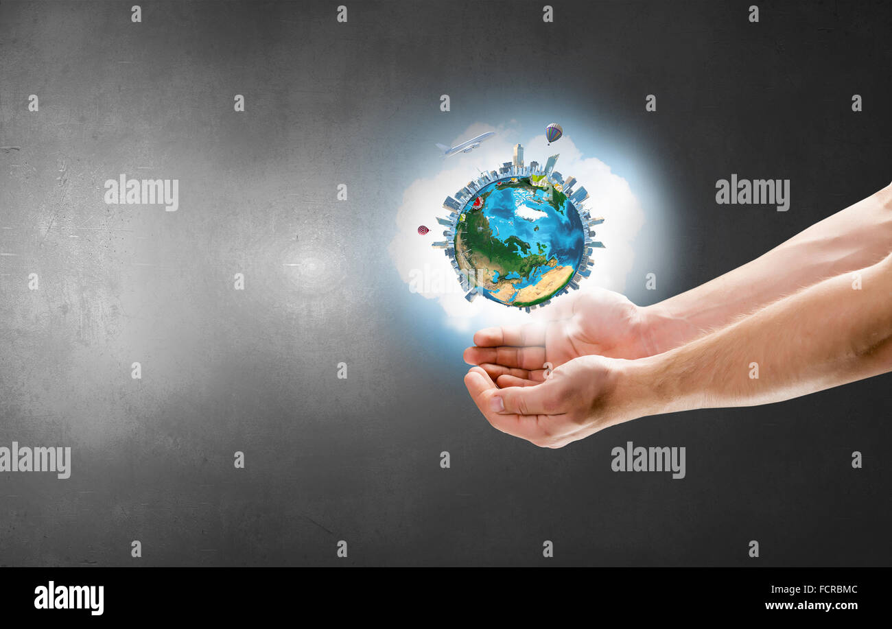 Close up of male hand holding our Earth planet. Elements of this image ...