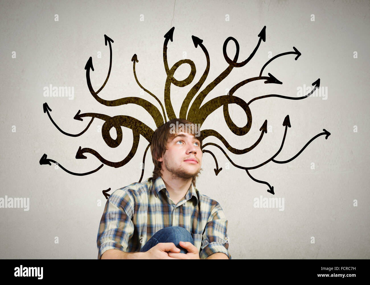 Young pensive man and thoughts coming out of his head Stock Photo - Alamy