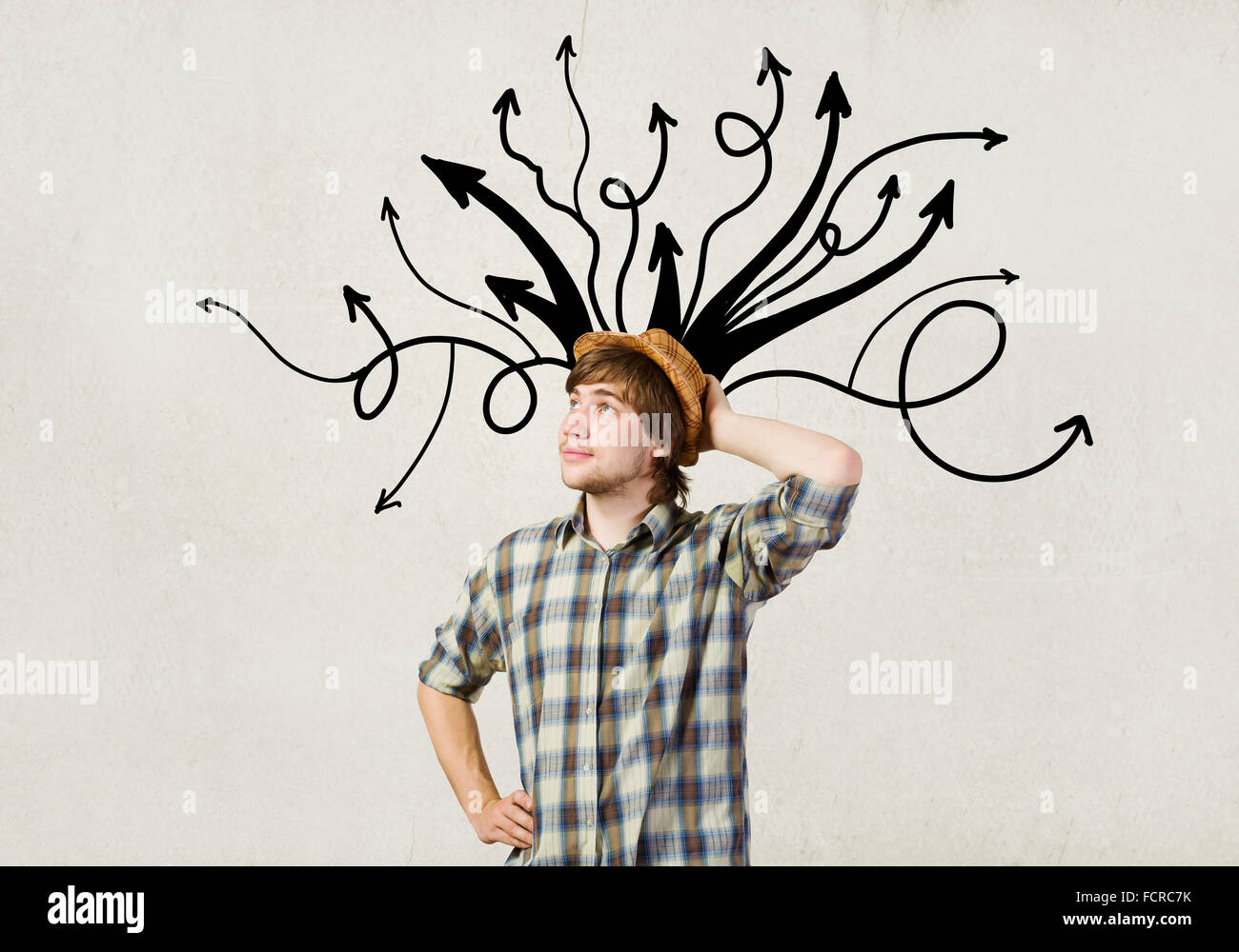 Young pensive man and thoughts coming out of his head Stock Photo - Alamy