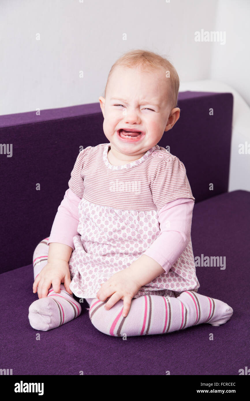 Crying baby girl Stock Photo - Alamy