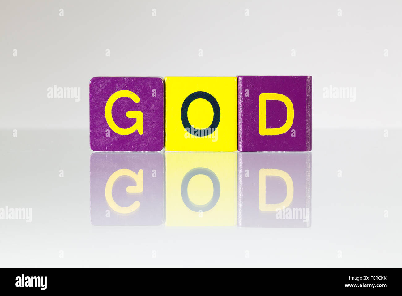 God - an inscription from children's wooden blocks Stock Photo - Alamy