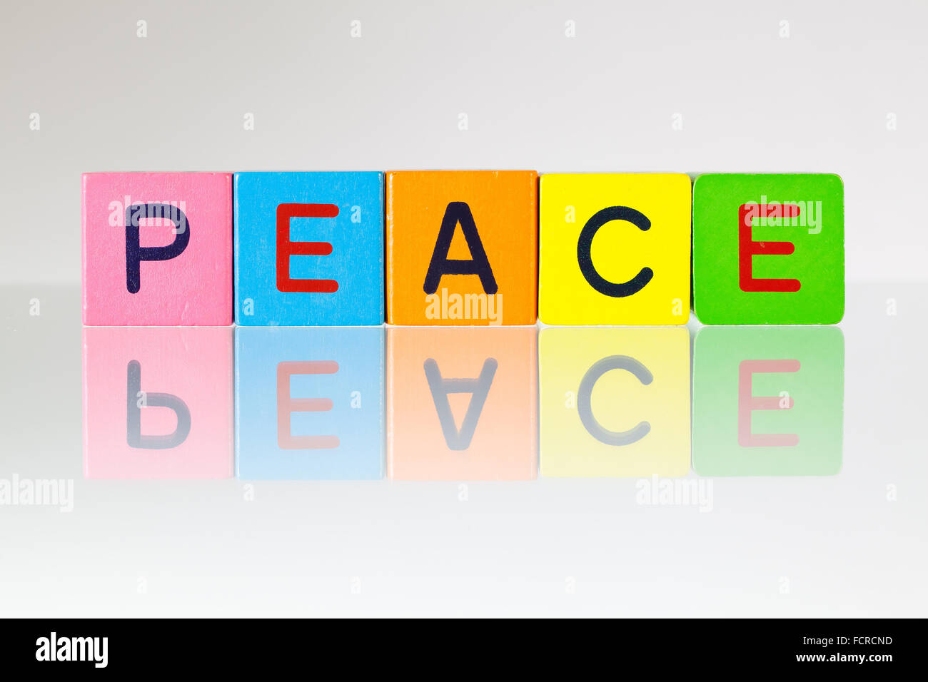 Peace - an inscription from children's wooden blocks Stock Photo - Alamy