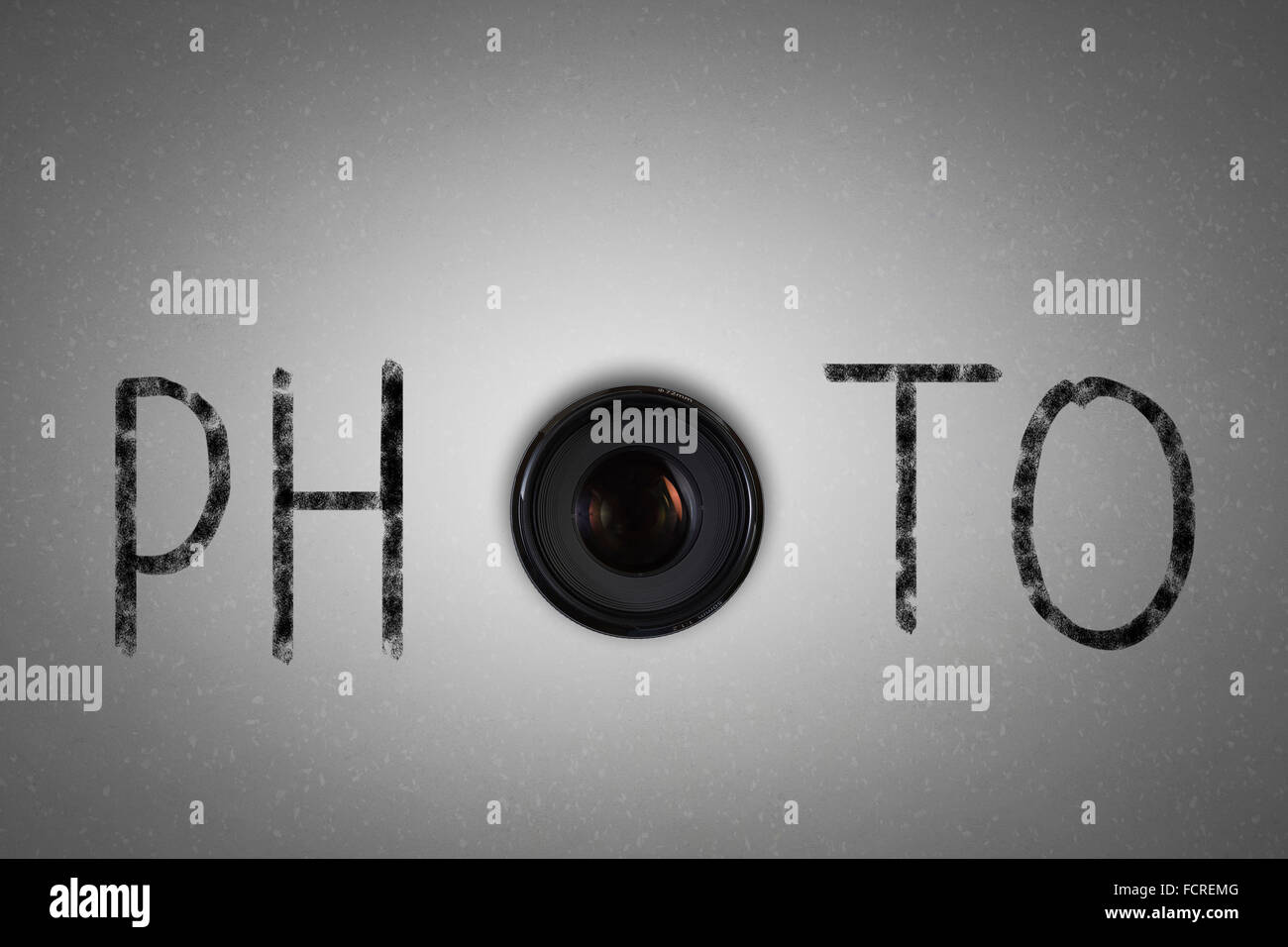 Word photo with camera zoom instead of letter O Stock Photo - Alamy