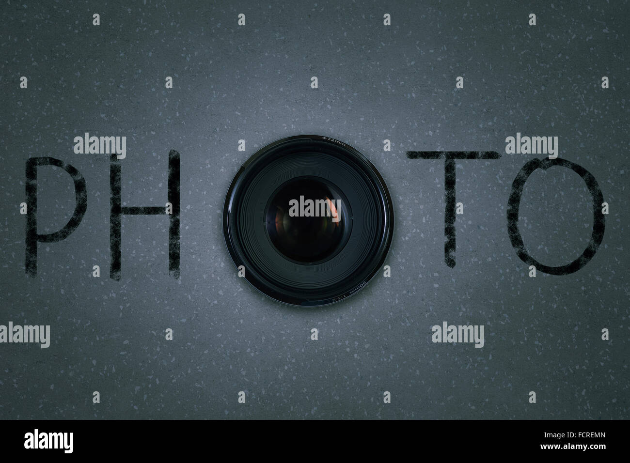 Word photo with camera zoom instead of letter O Stock Photo - Alamy