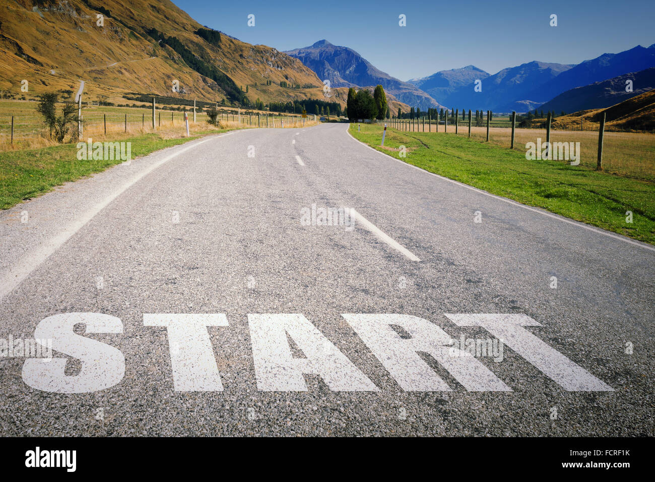 Start word as motivation writen on asphalt road Stock Photo - Alamy