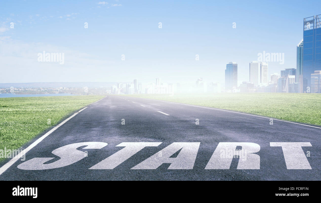 Start word as motivation writen on asphalt road Stock Photo - Alamy