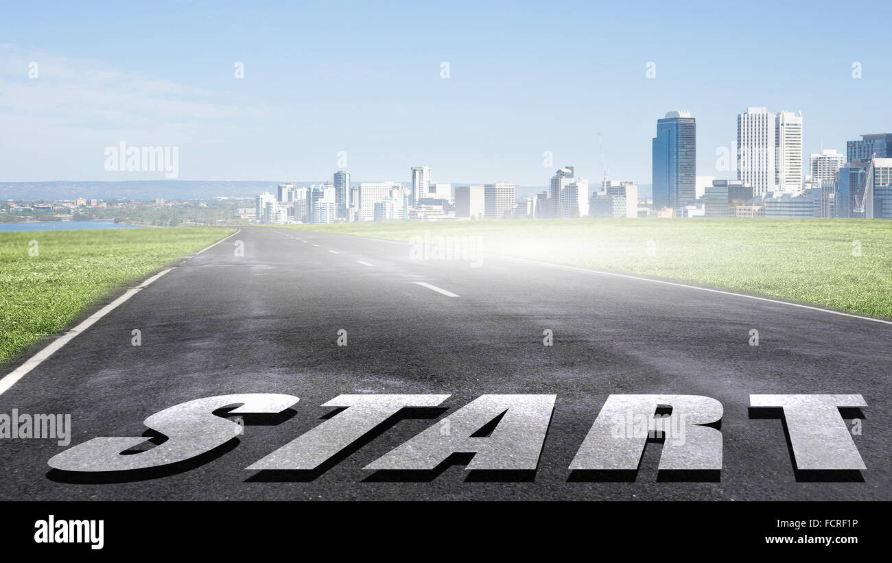 Start word as motivation writen on asphalt road Stock Photo - Alamy