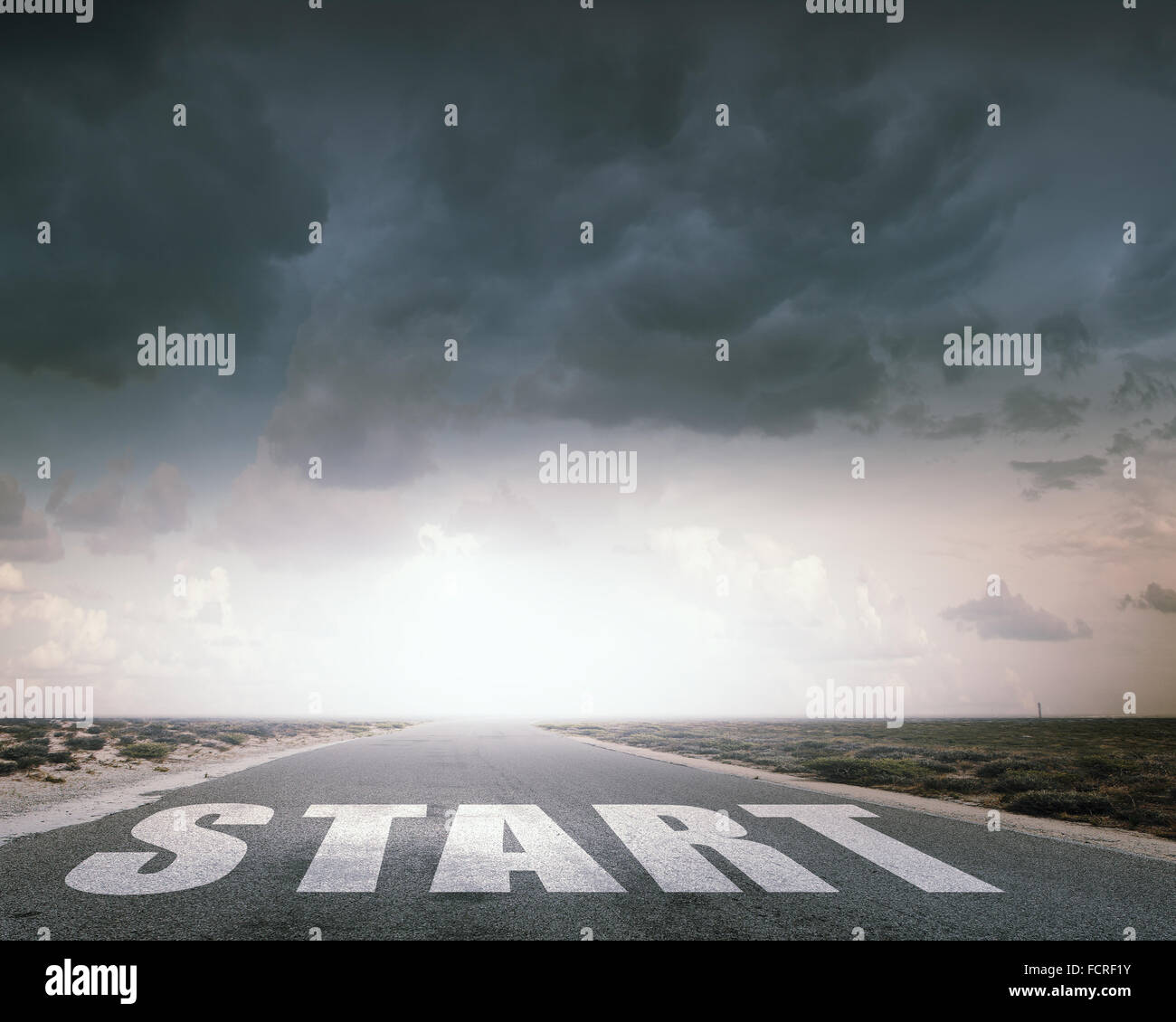 Start word on asphalt road and sunrise at horison line Stock Photo - Alamy