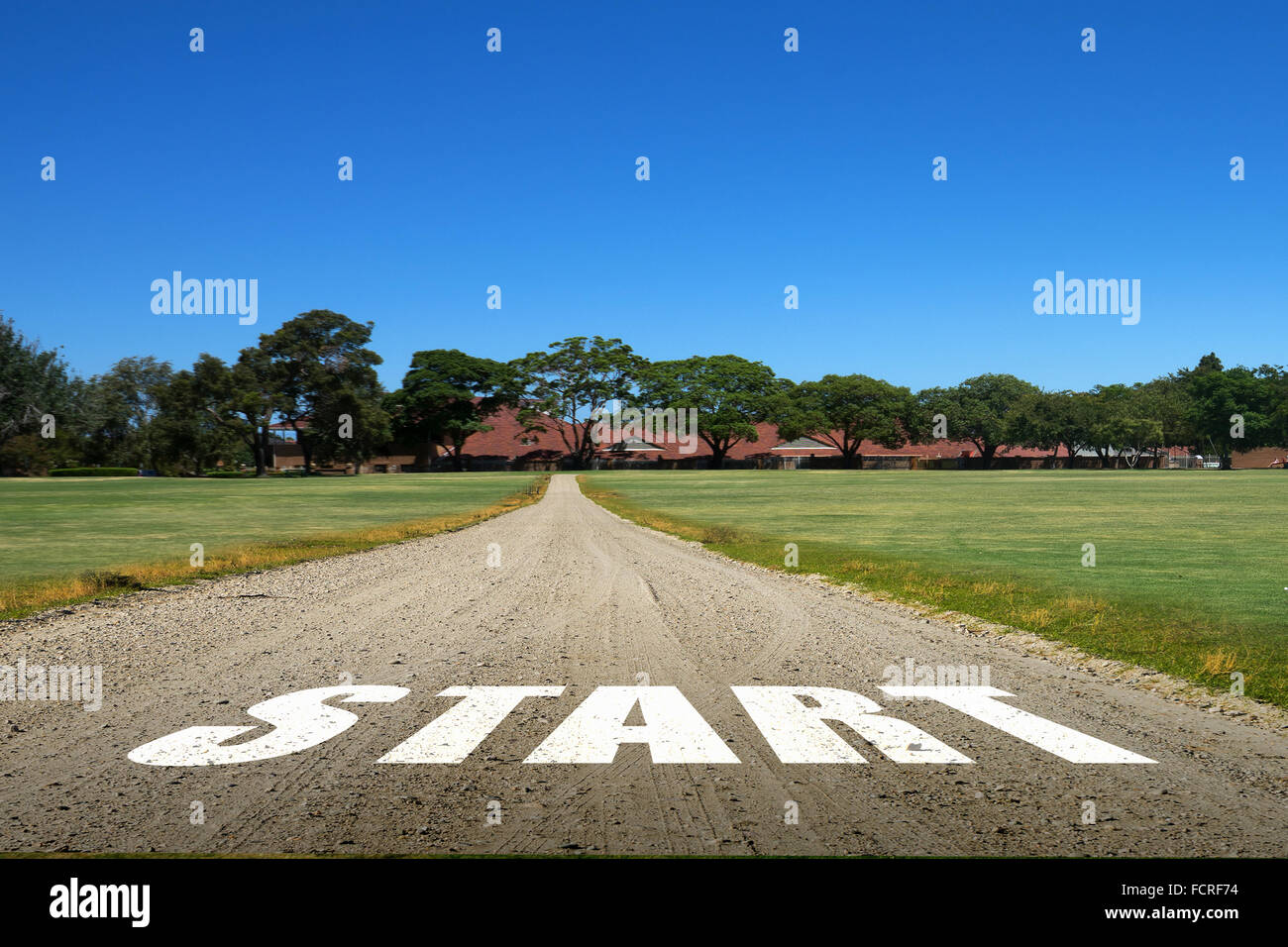 Start word as motivation writen on asphalt road Stock Photo - Alamy