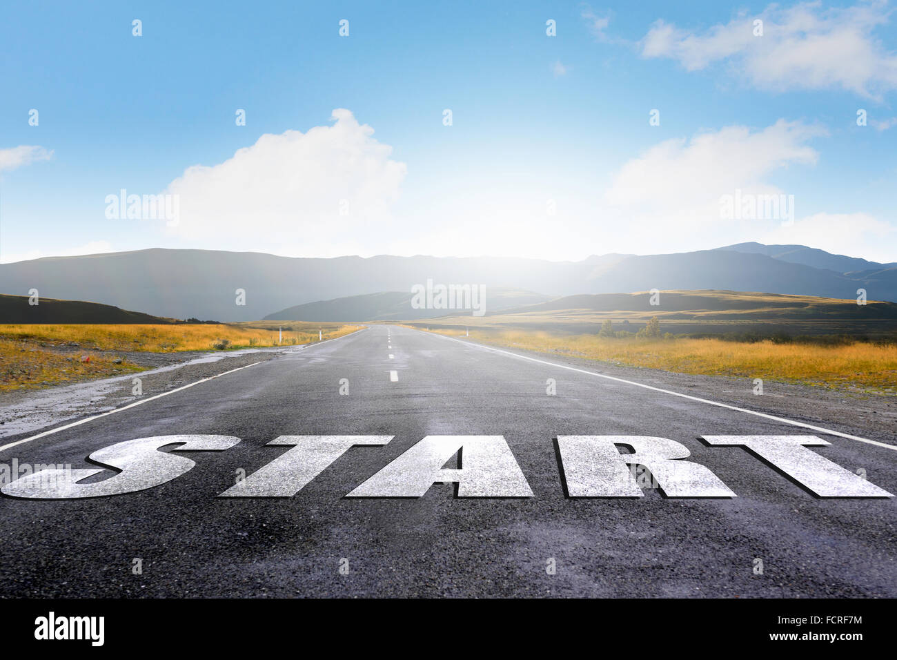 Start word as motivation writen on asphalt road Stock Photo - Alamy