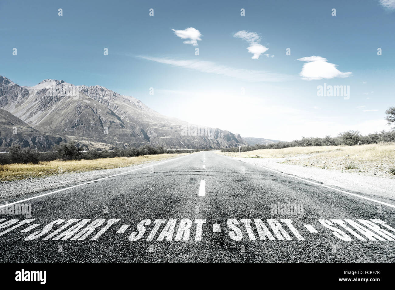 Start word as motivation writen on asphalt road Stock Photo - Alamy