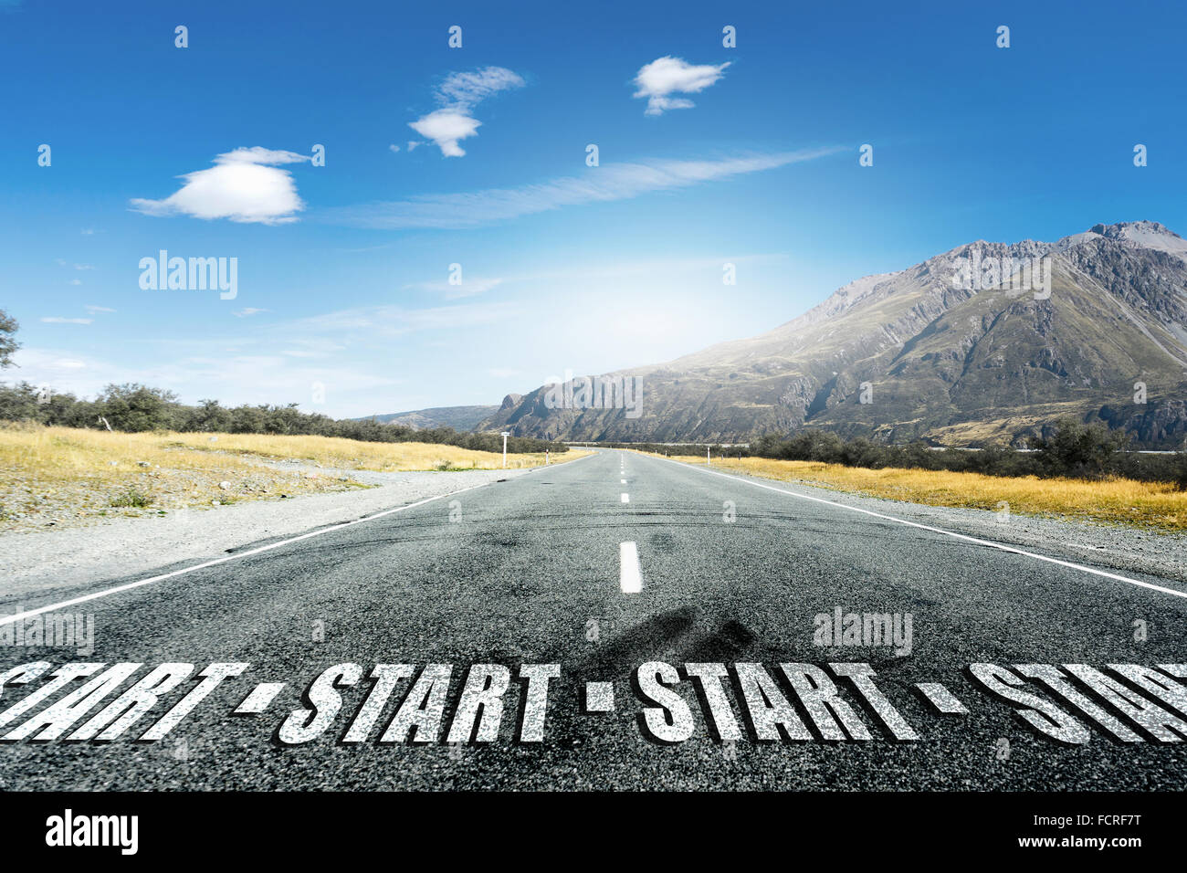 Start word as motivation writen on asphalt road Stock Photo - Alamy