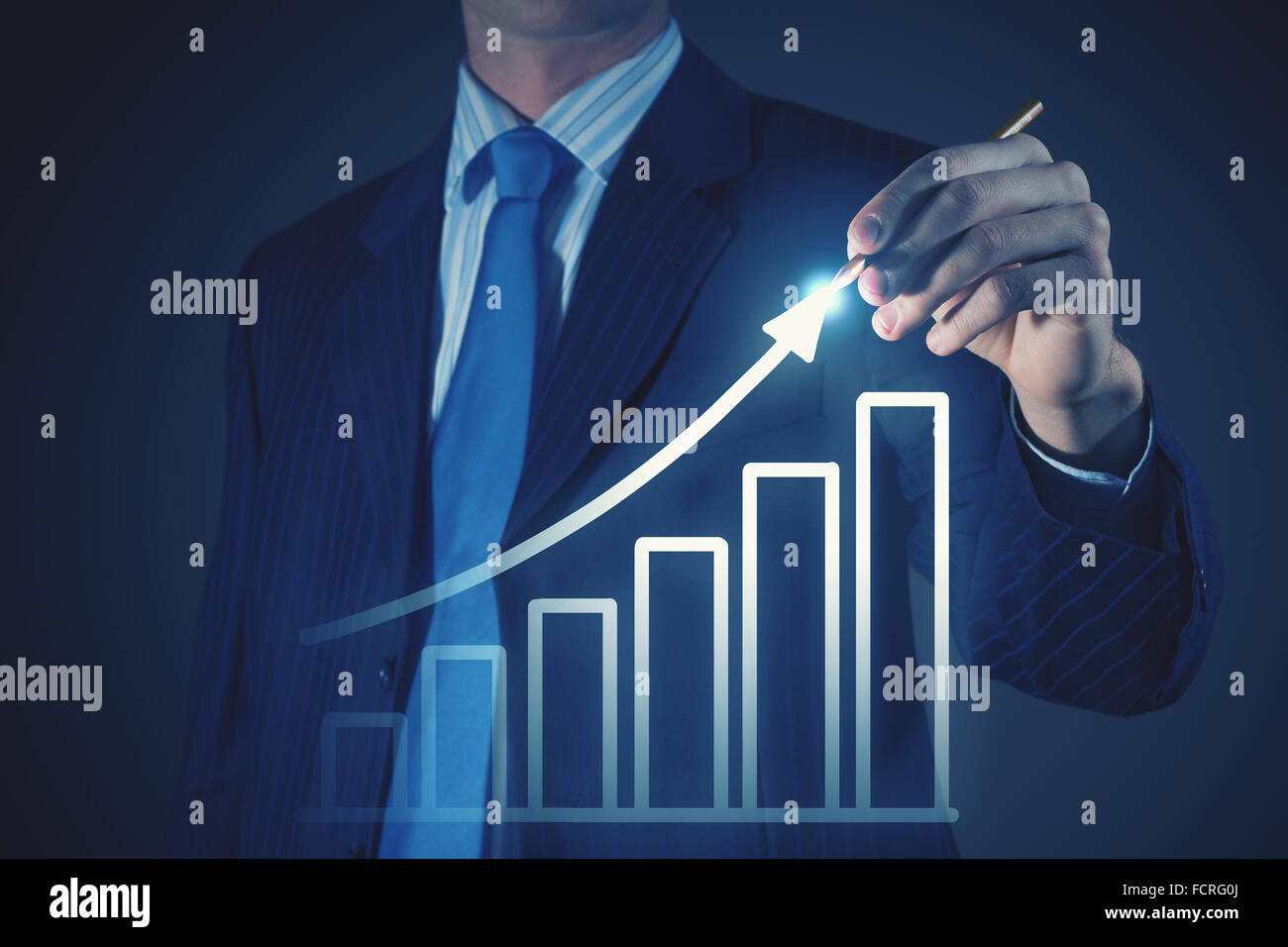 Chest view of businessman drawing with pencil increasing graph Stock ...