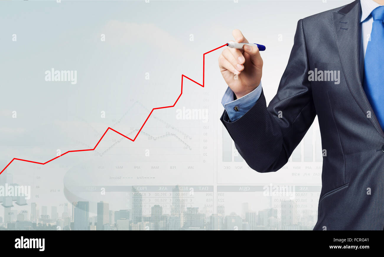 Chest view of businessman drawing with pencil increasing graph Stock ...