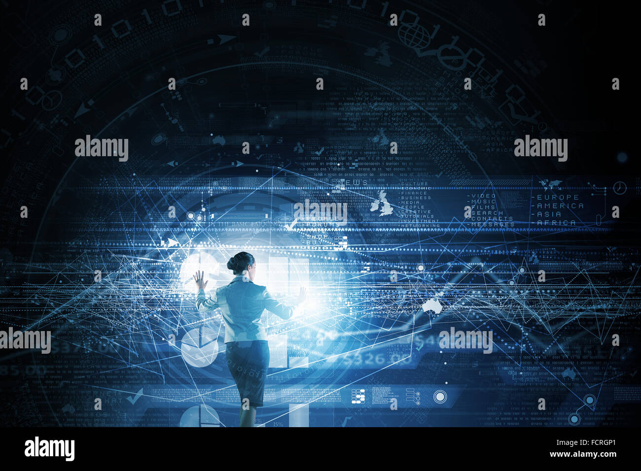 Back view of businesswoman working with modern virtual technologies ...