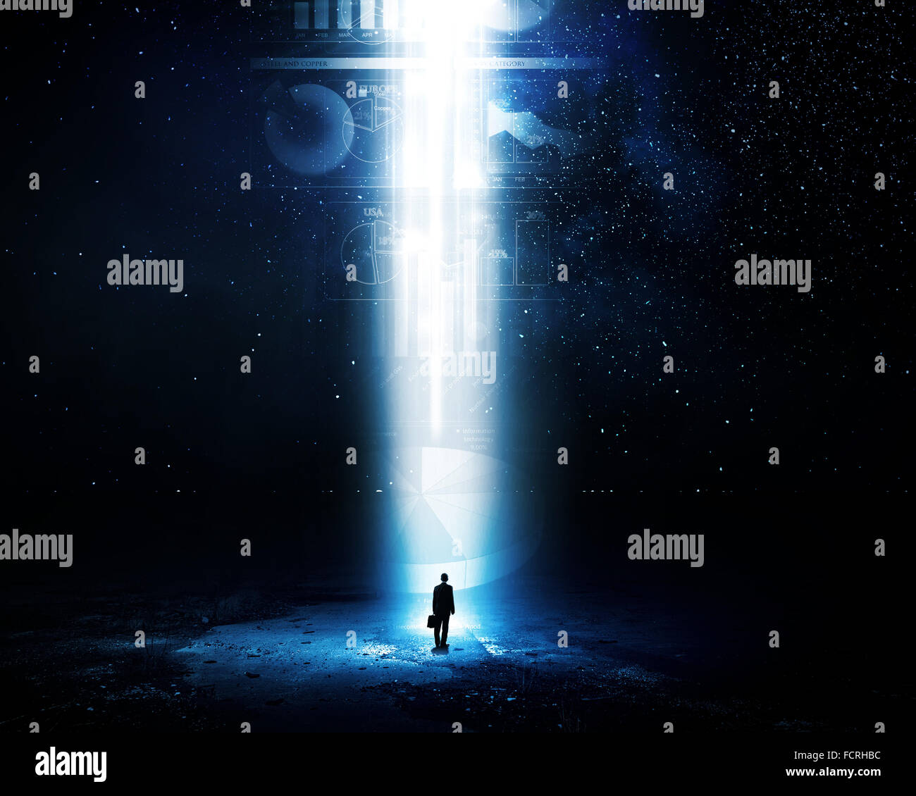 Rear view of businessman standing in light of way Stock Photo - Alamy