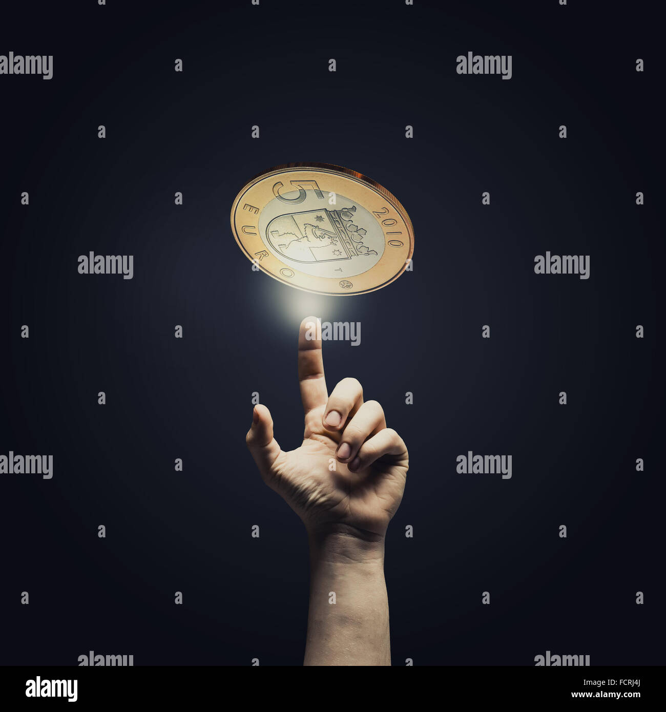 Human hand pointing with finger at euro coin Stock Photo - Alamy