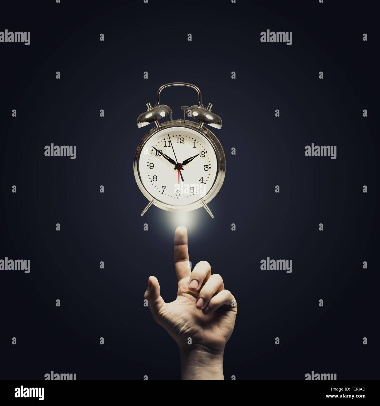 Close up of man hand pointing at clock watch symbol Stock Photo - Alamy