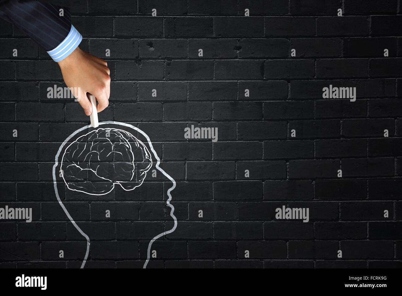 Human hand drawing brain on black chalkboard Stock Photo - Alamy