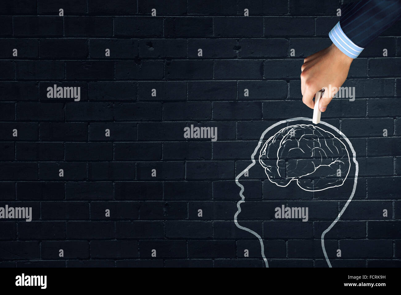 Human hand drawing brain on black chalkboard Stock Photo - Alamy
