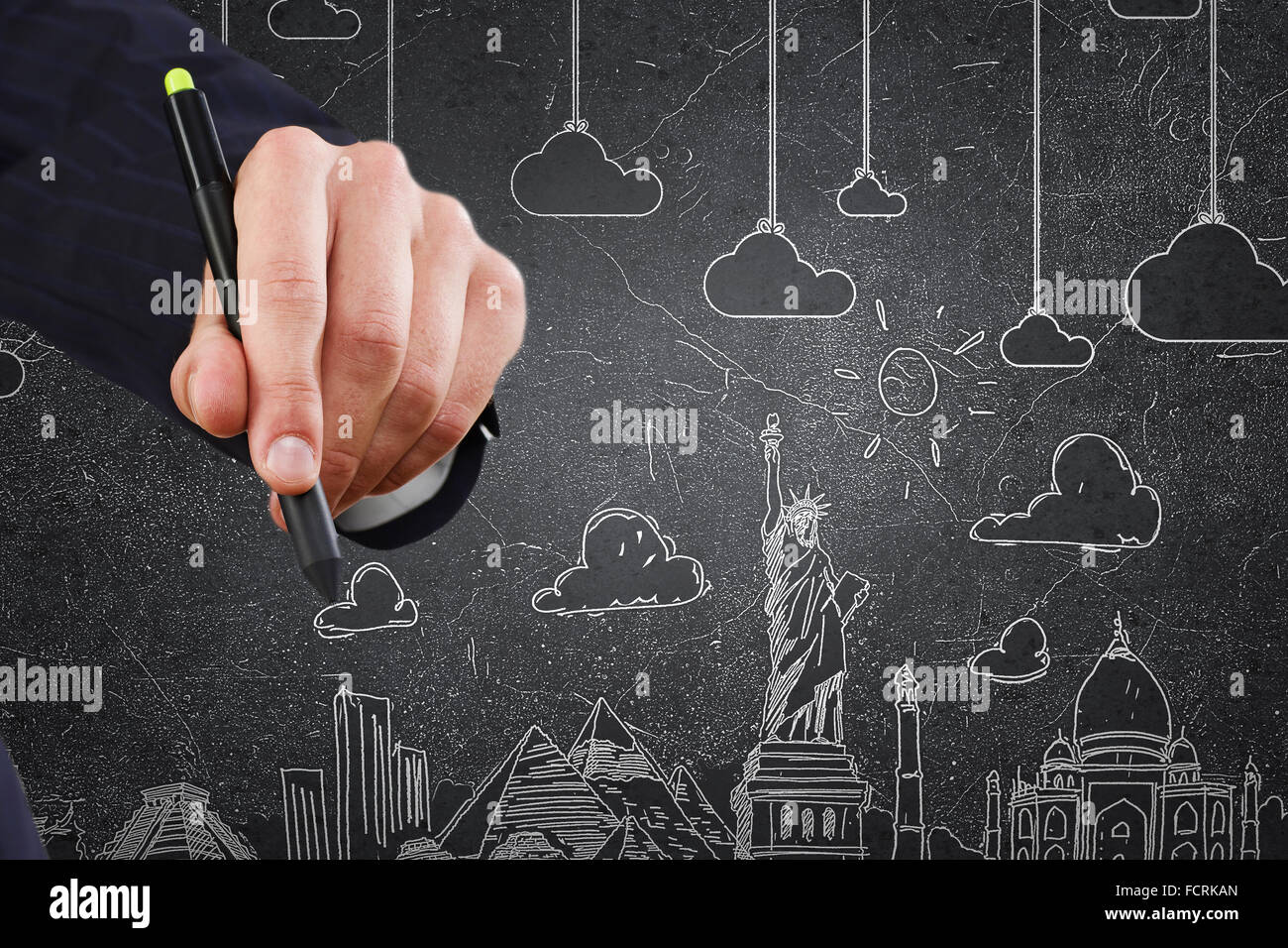 Businessman hand drawing dream travel around the world Stock Photo - Alamy