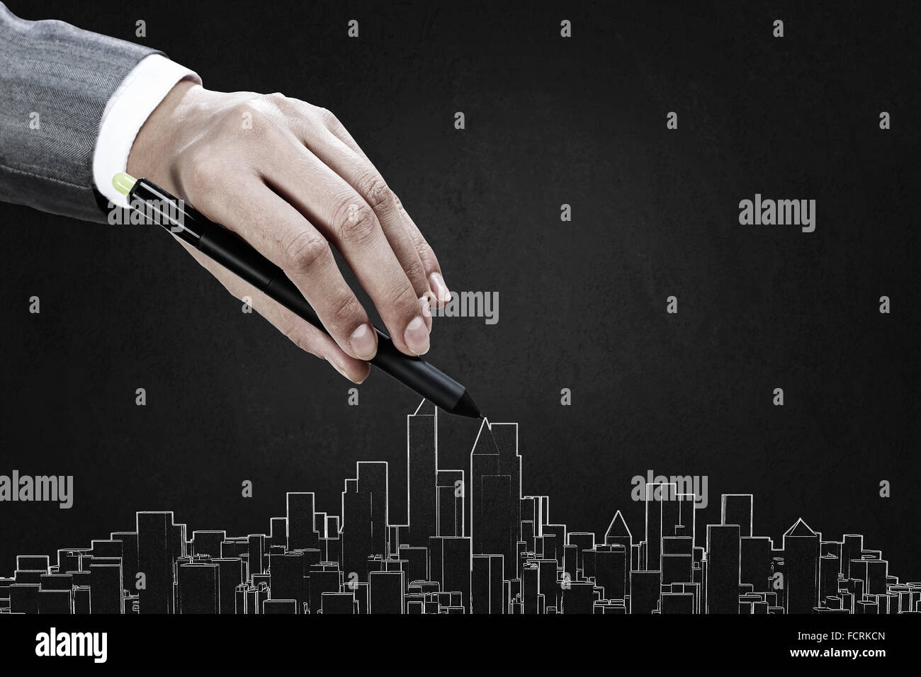 Close up of hand drawing urban buildings with marker Stock Photo - Alamy