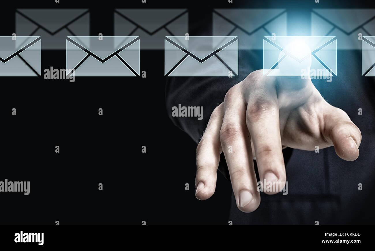 Businessman hand pressing icon of media screen Stock Photo - Alamy