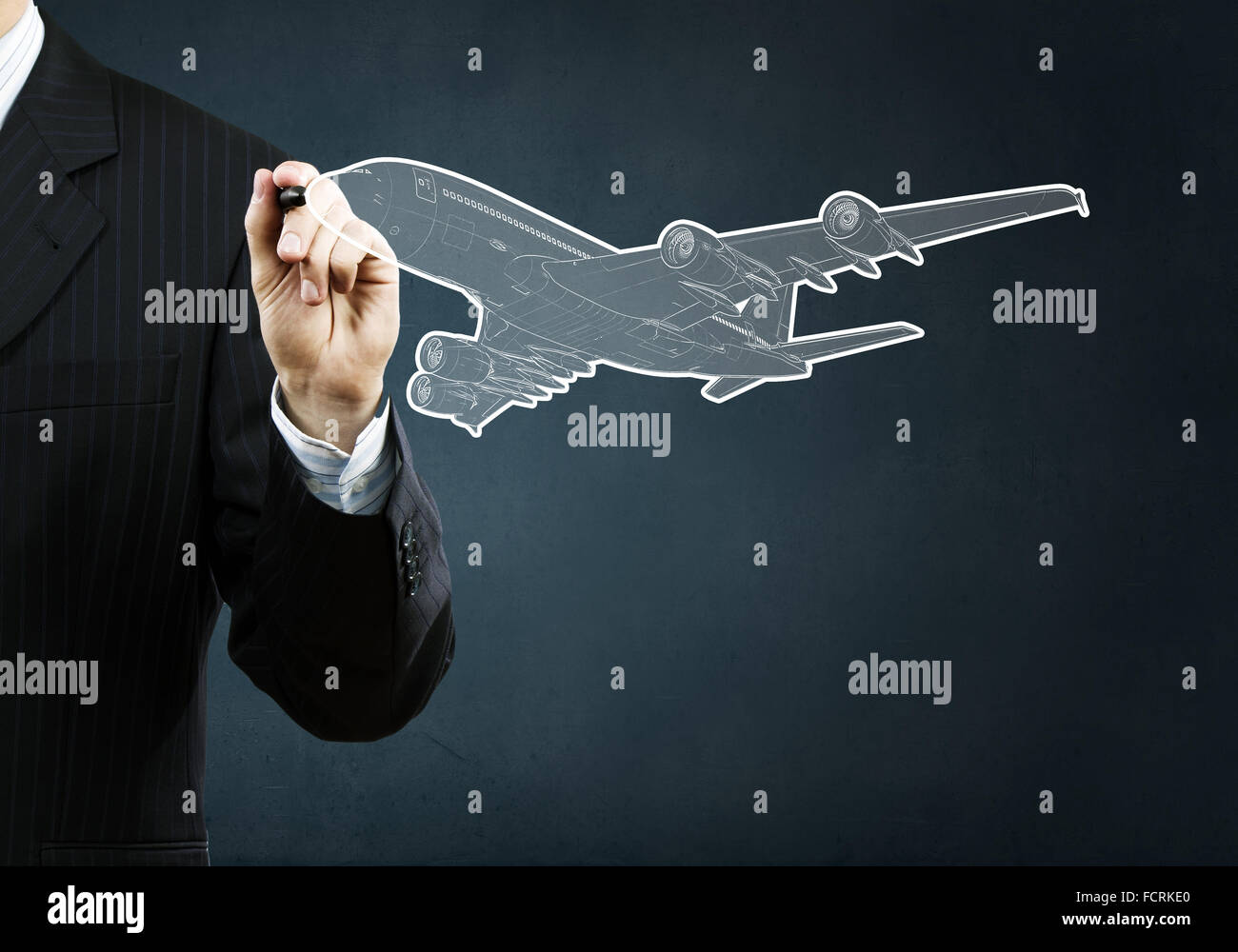 Close up of hand drawing airplane on black background Stock Photo - Alamy