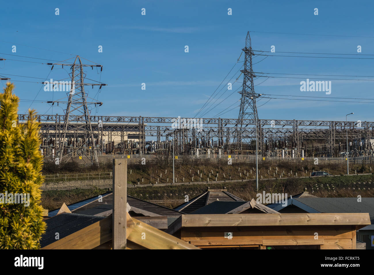 Electricity pylon overlooking the sub-station in North Kent Stock Photo ...