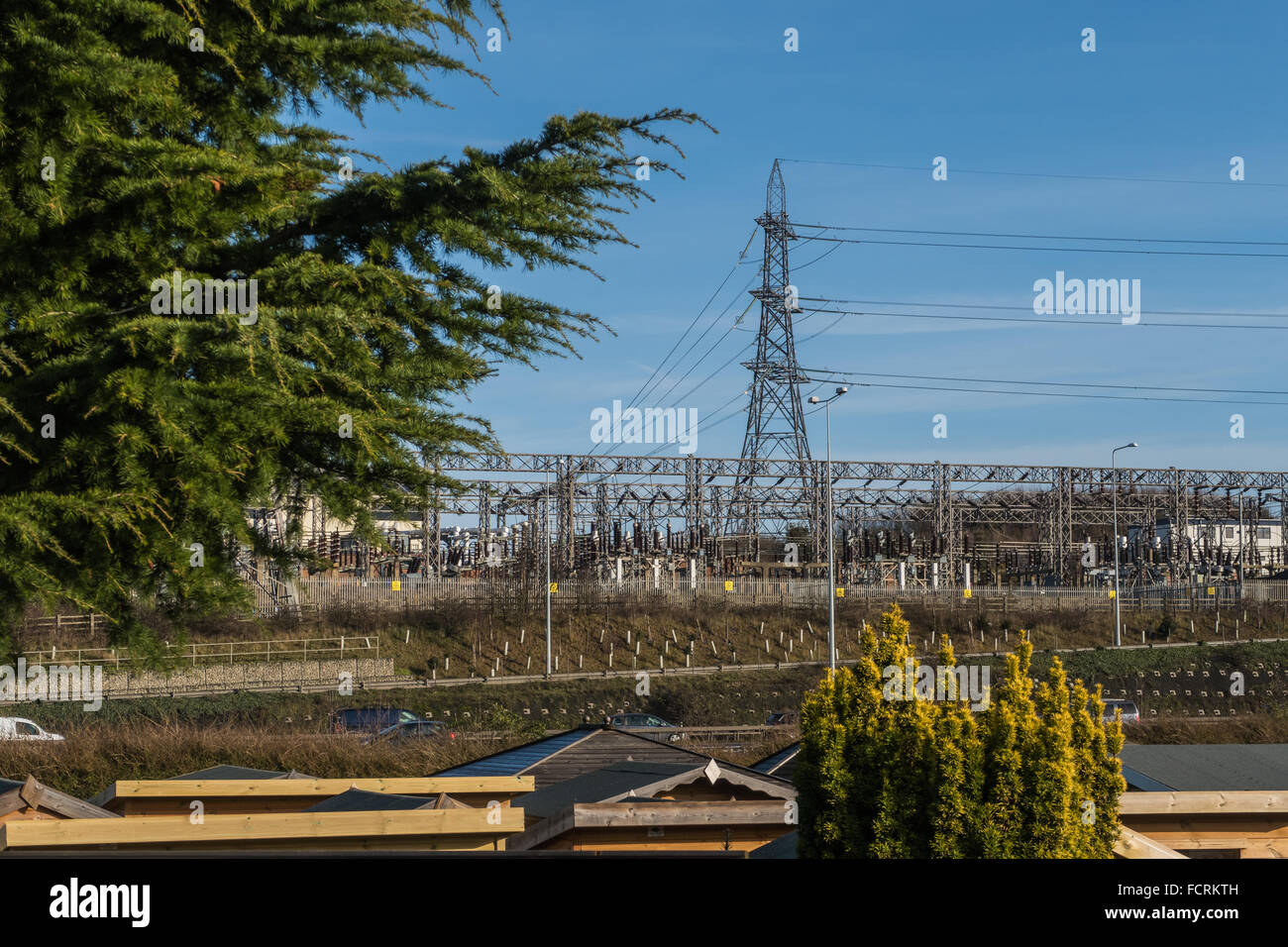Electricity pylon overlooking the sub-station in North Kent Stock Photo ...