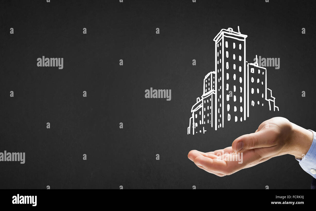 Close up of hand and drawn building model in palm Stock Photo - Alamy