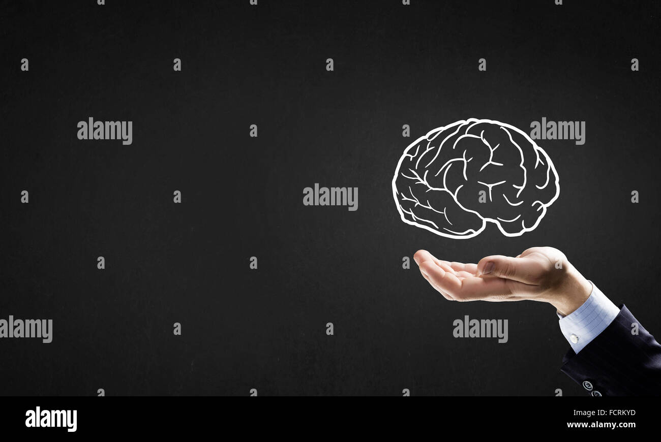 Brain in hand or save intelligence concept Stock Photo - Alamy