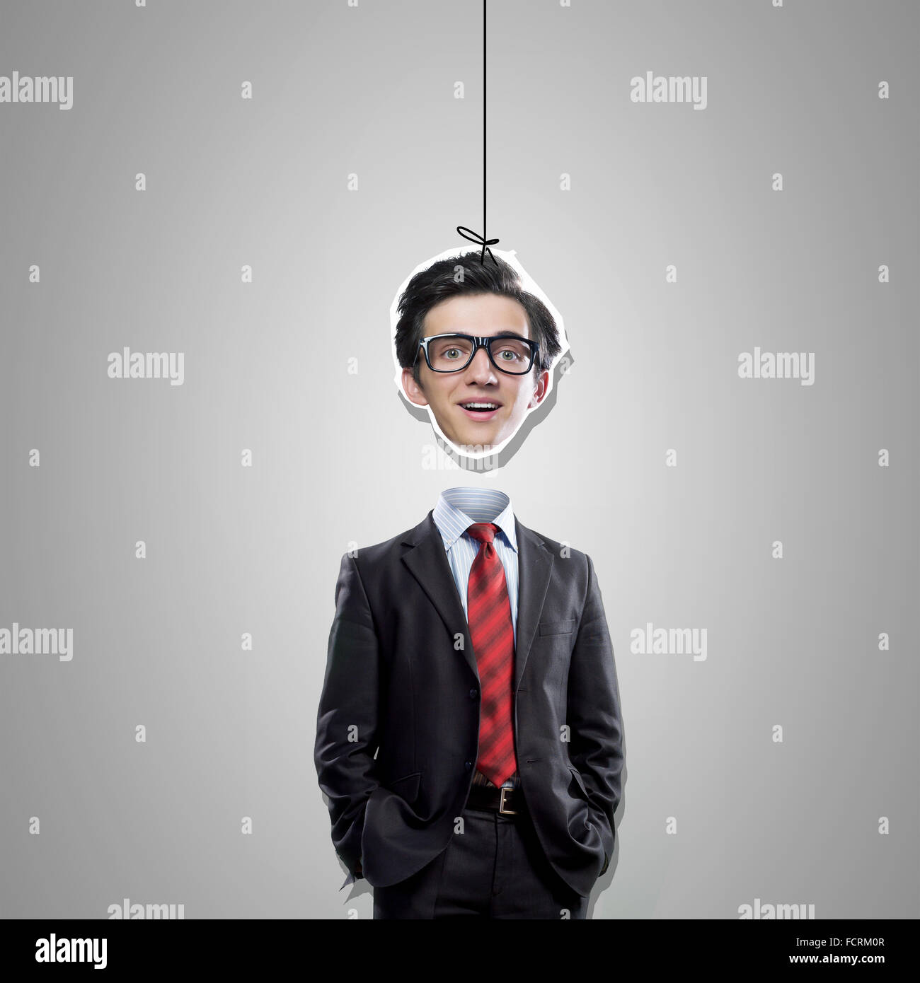 Funny businessman and his head hanging on rope Stock Photo - Alamy