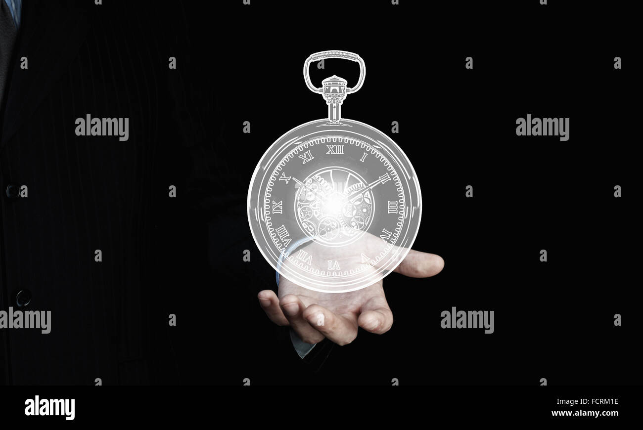 Close up of businessman hand showing pocket watch symbol Stock Photo ...