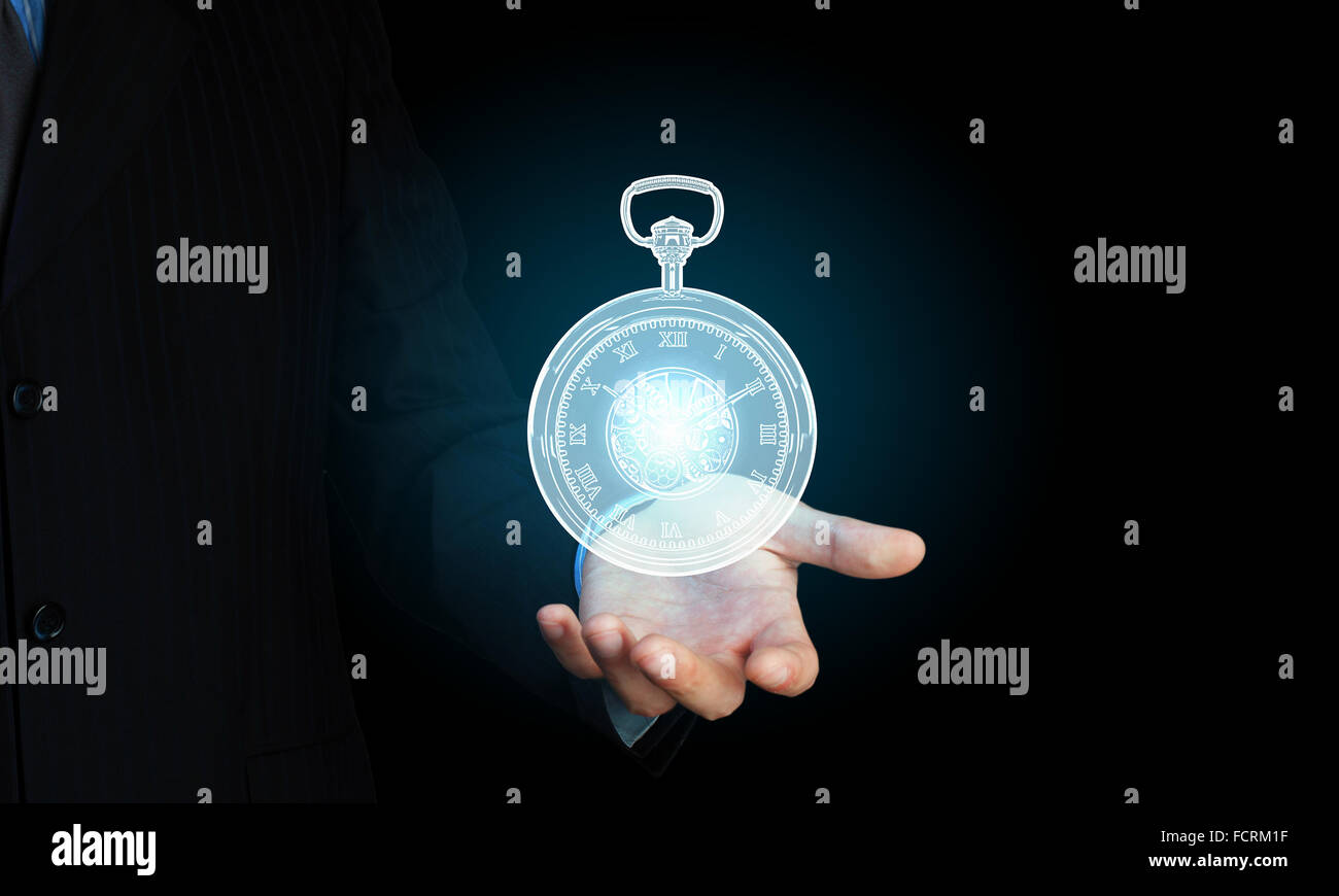 Close up of businessman hand showing pocket watch symbol Stock Photo ...