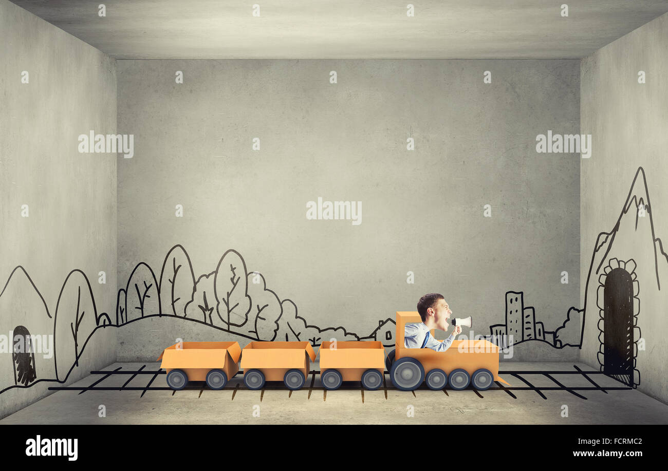 Funny cartoon image of businessman riding carton box Stock Photo - Alamy