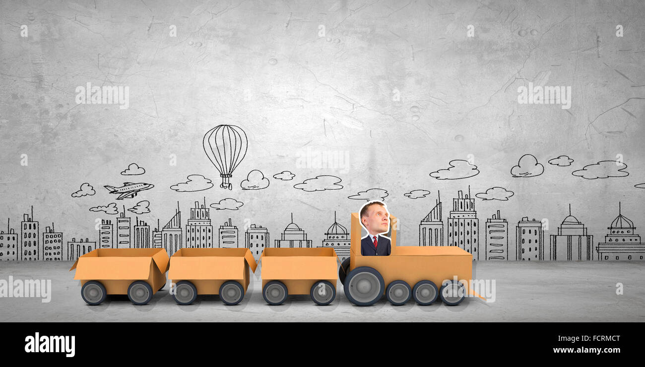 Funny cartoon image of businessman riding carton box Stock Photo - Alamy