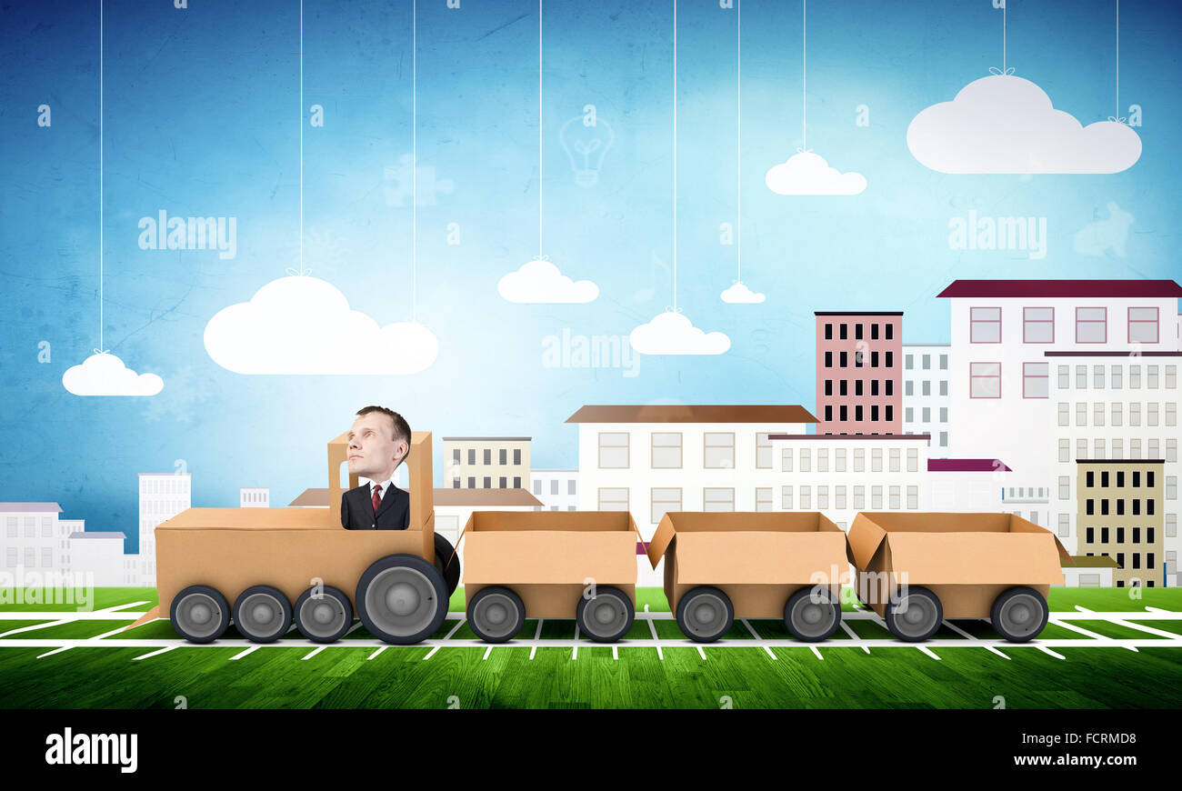 Funny cartoon image of businessman riding carton box Stock Photo - Alamy